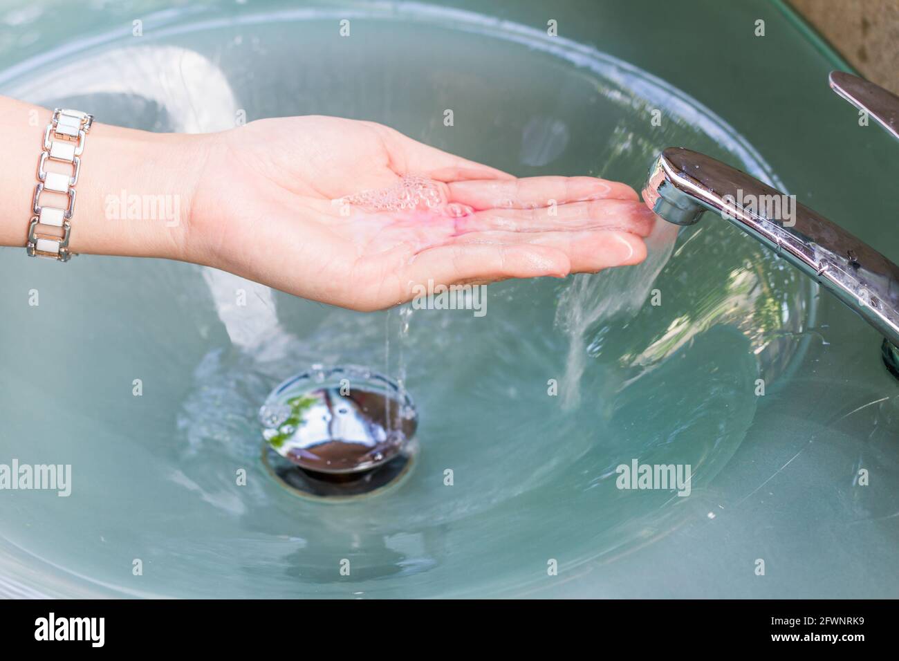 girl washing her hand out door Stock Photo - Alamy
