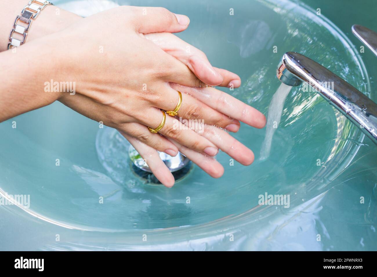 girl washing her hand out door Stock Photo - Alamy