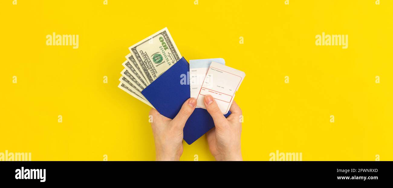 Banner boarding pass in woman hand with passport and money, traveling ...
