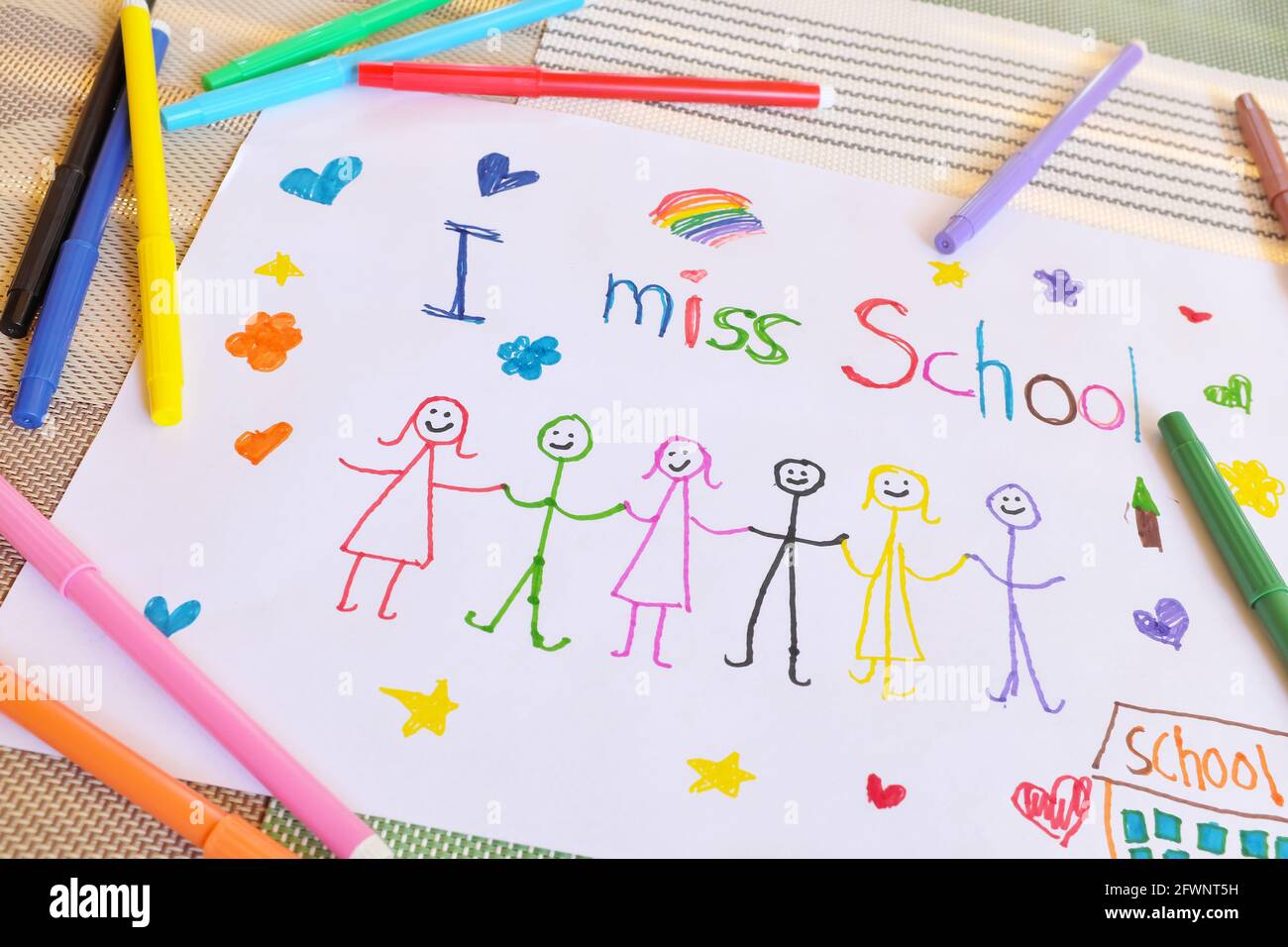 Child holding I miss School message on paper. Sadness in homeschooling ...