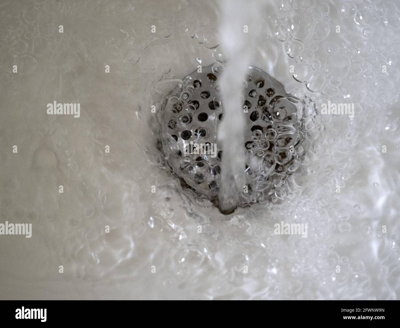 water flowing flushing running in the sink drops spray detail Stock ...