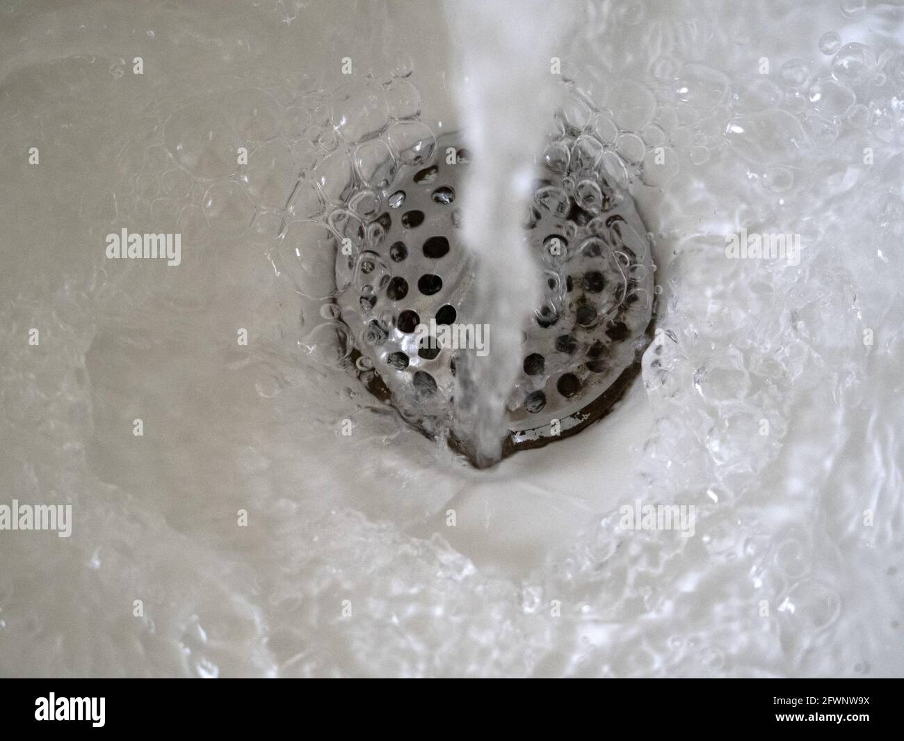 water flowing flushing running in the sink drops spray detail Stock ...
