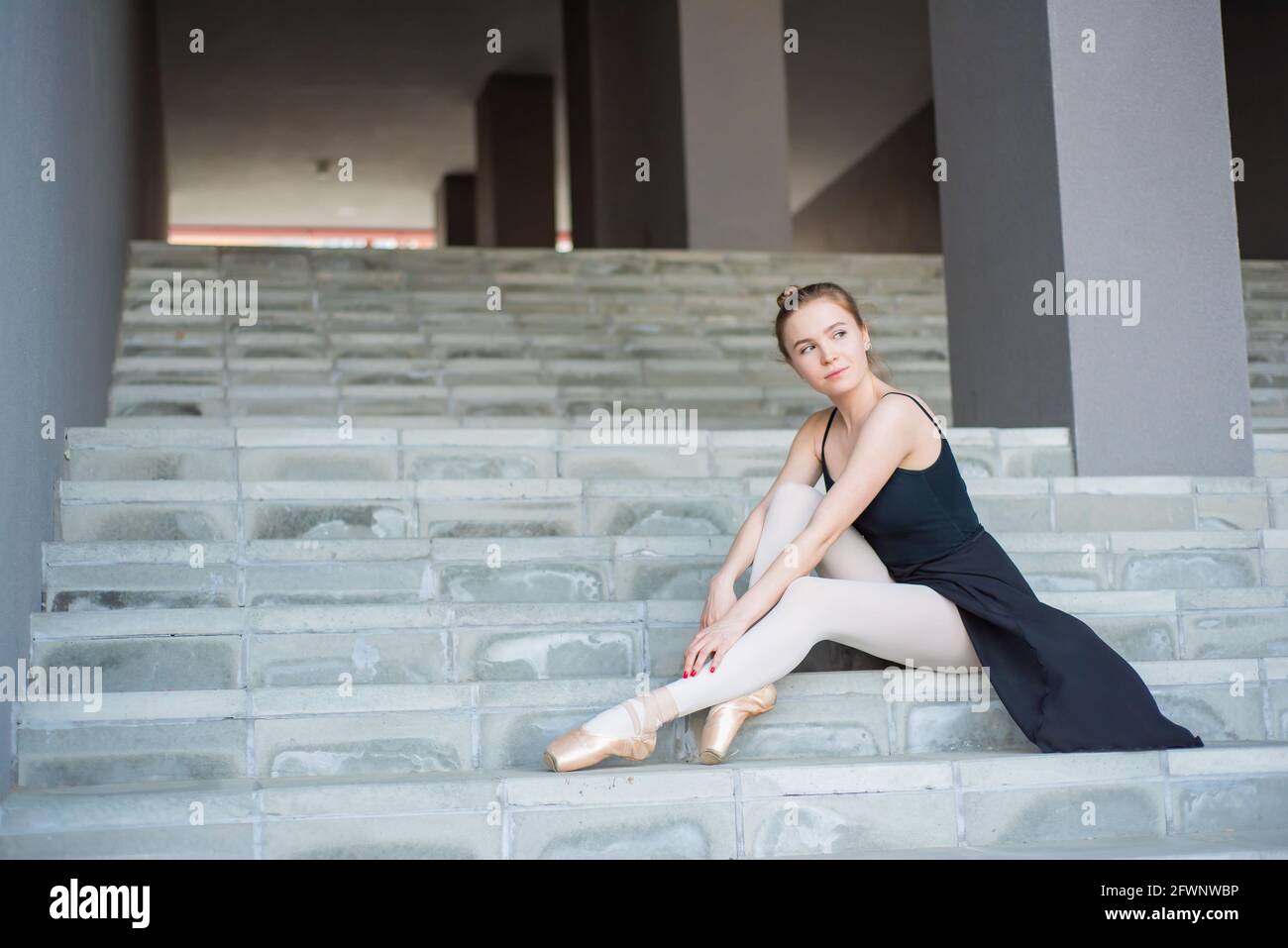 Young ballerina resting in ballet hi-res stock photography and images ...