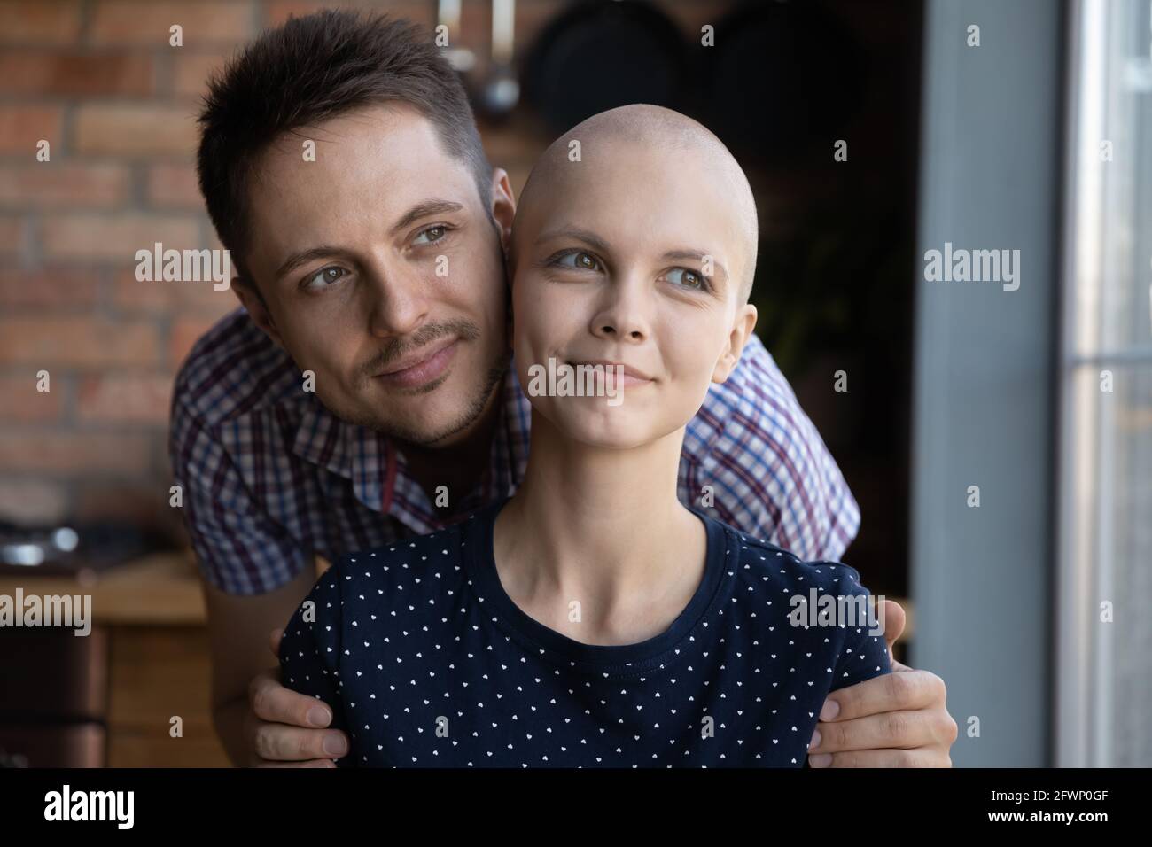 Happy young couple fighting against woman cancer Stock Photo - Alamy