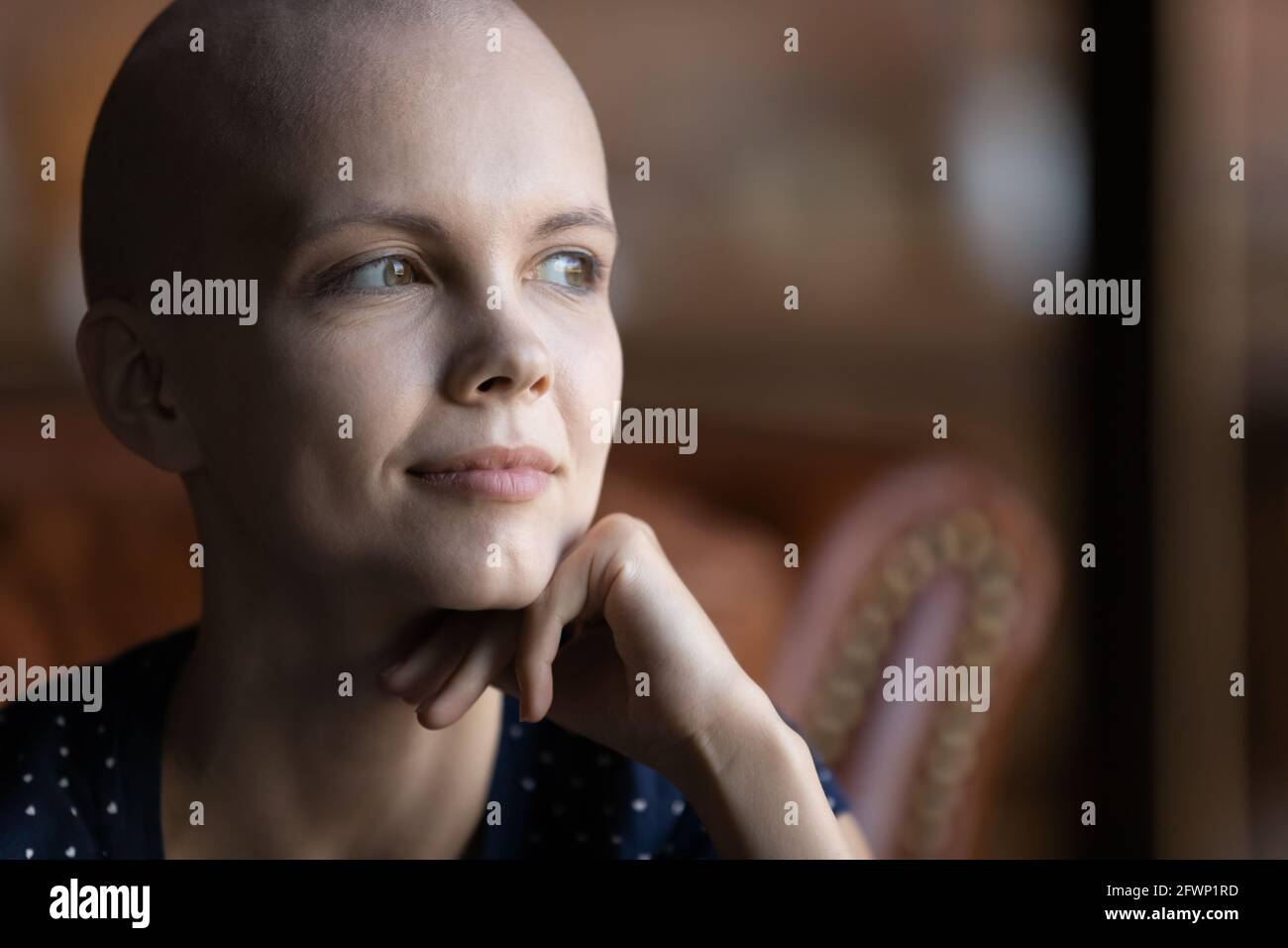 Pensive patient with cancer thinking of recovery after successful ...
