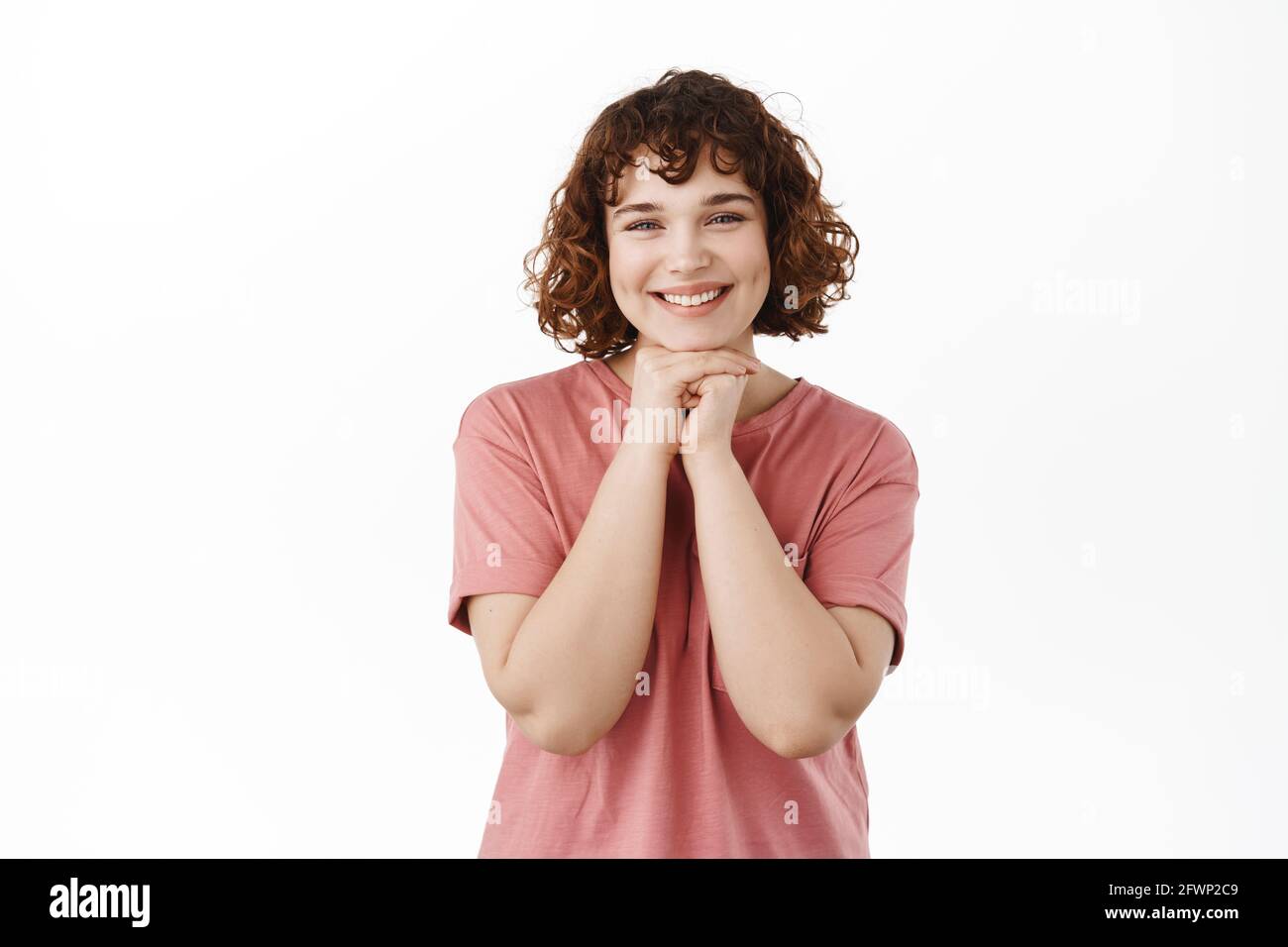 Portrait of authentic beautiful woman with curly hair, lean on hands ...