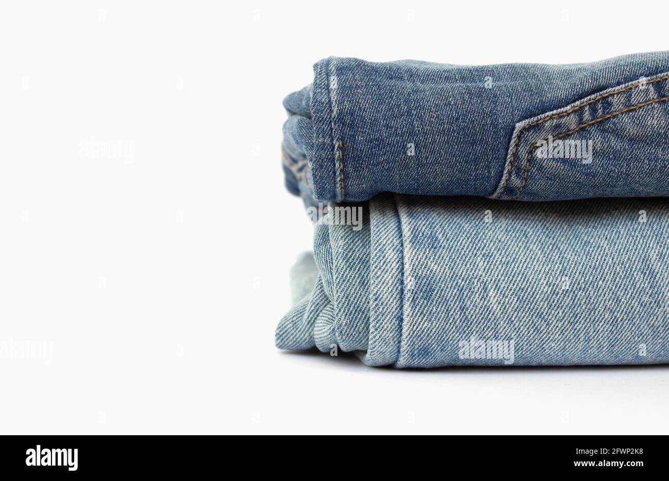 Stack blue jeans hi-res stock photography and images - Alamy