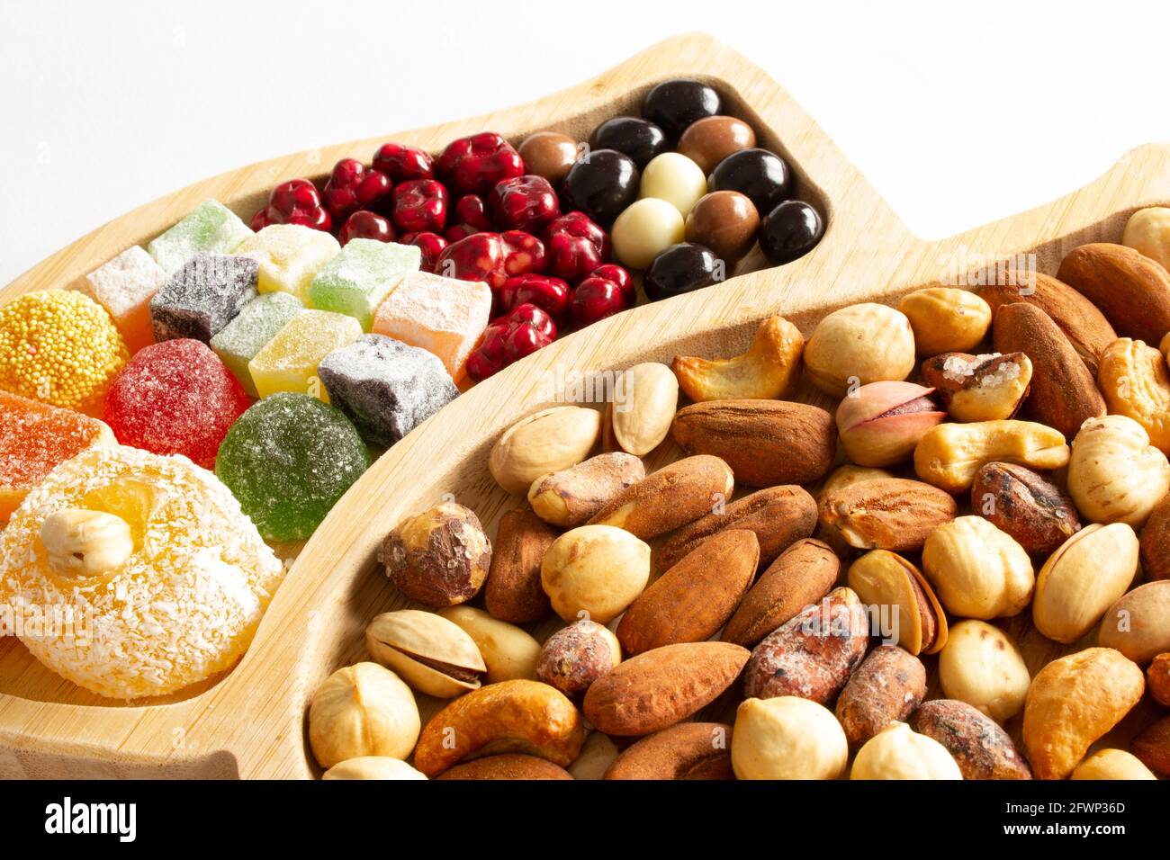 Mixed nuts, Turkish delight and candies Stock Photo - Alamy