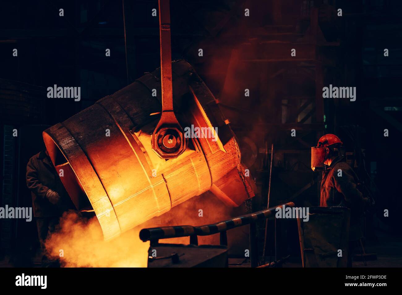 Worker Pouring Molten Iron High Resolution Stock Photography and Images ...