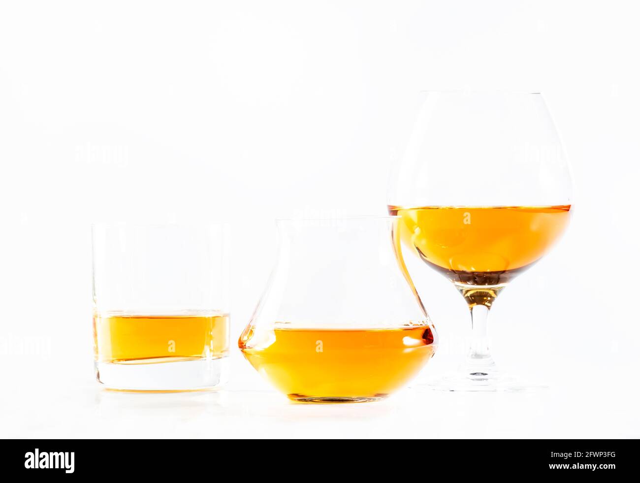 Hard strong alcoholic drinks, spirits and distillates in glasses in ...