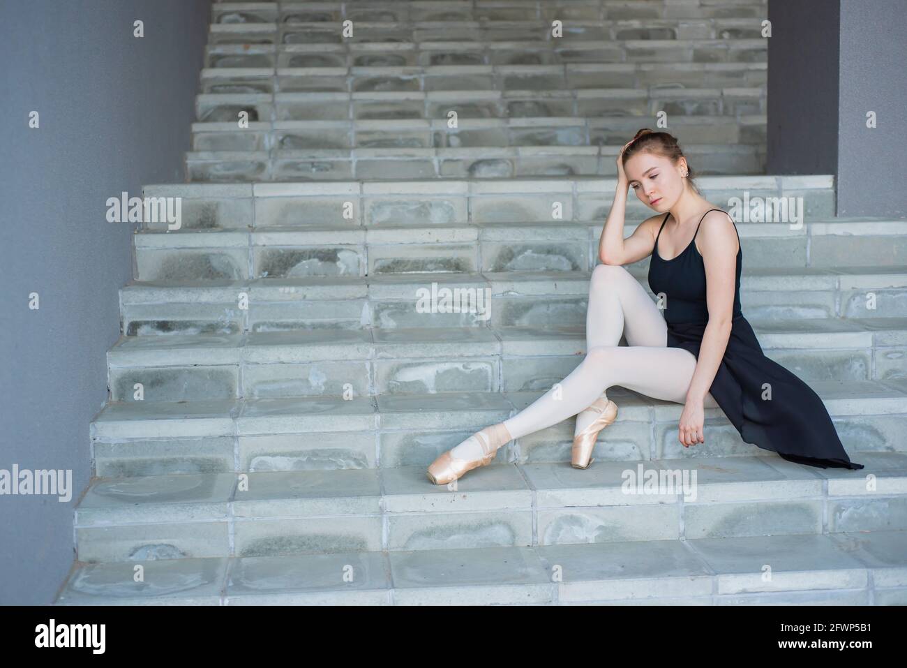 Young ballerina resting in ballet hi-res stock photography and images ...