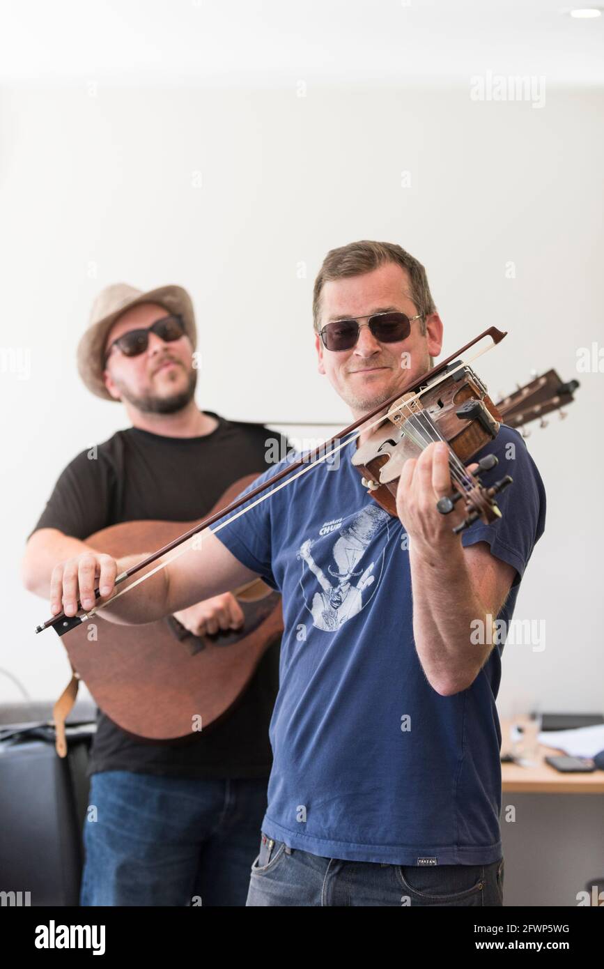 Musicians Playing Instruments High Resolution Stock Photography and ...