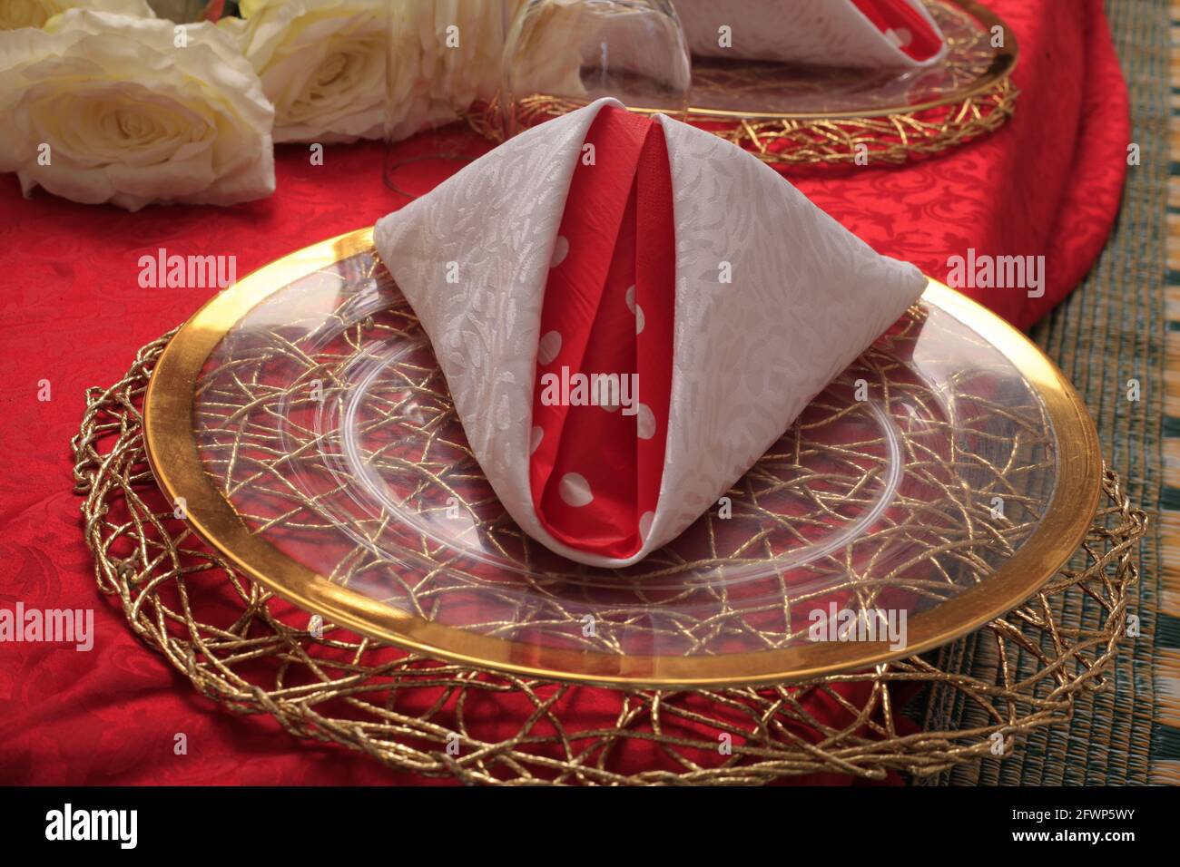 Wedding Decoration on the decorated table with golden glasses ear rings ...