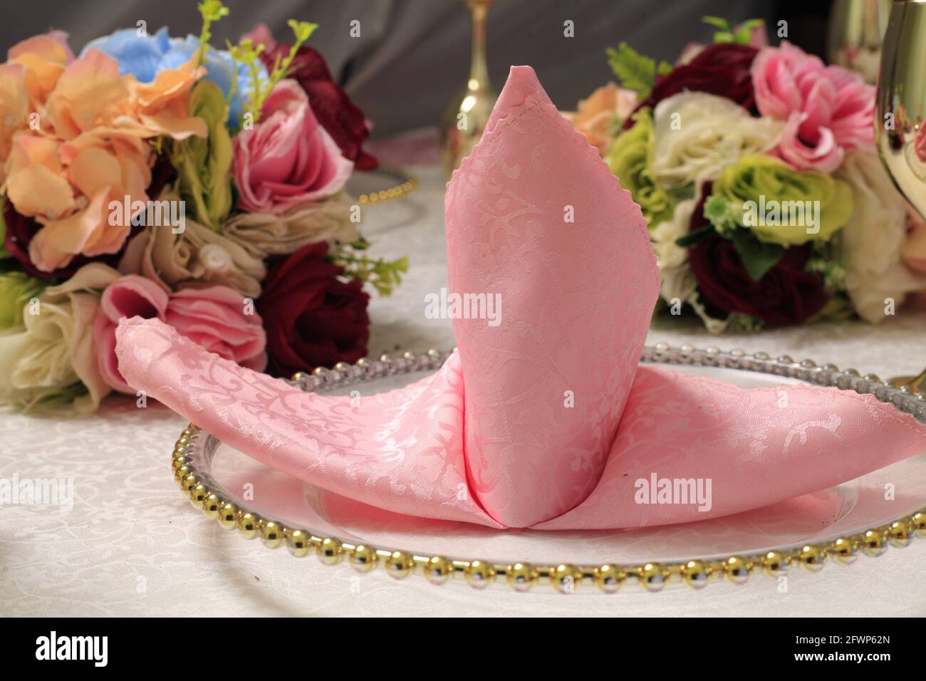 Wedding Decoration on the decorated table with golden glasses ear rings ...