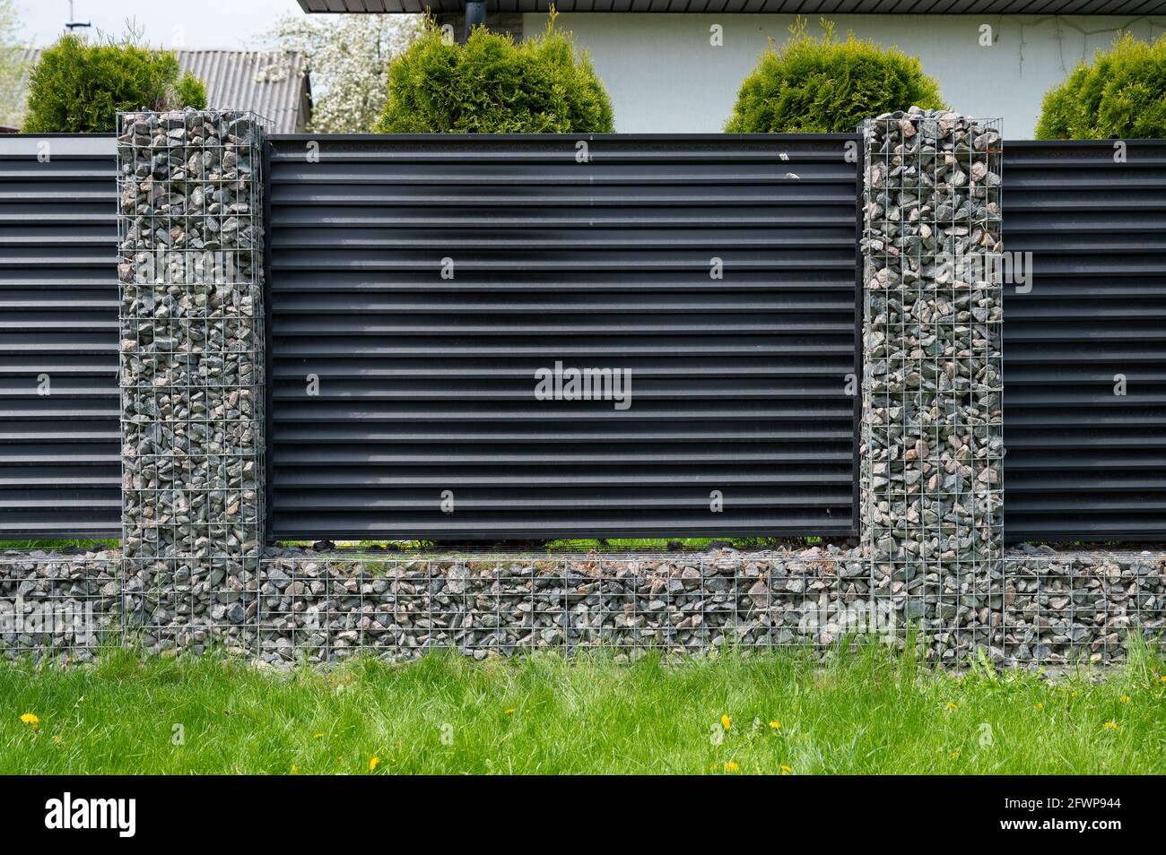 New build gabions fence. Gabion fence Stock Photo - Alamy