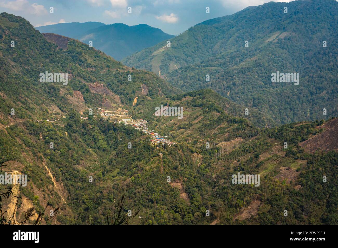 mountain range with dense green forests at morning from flat angle ...