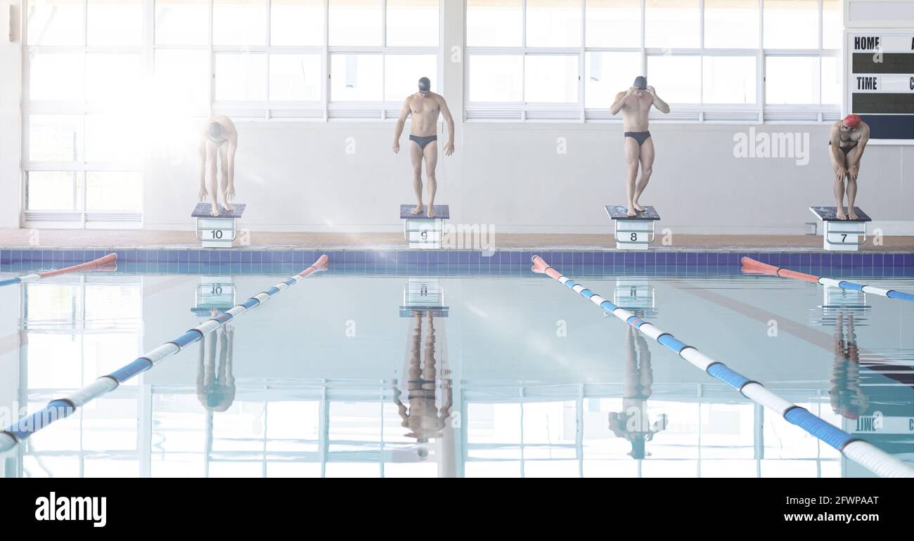 Composition of men getting ready to jump into swimming pool Stock Photo ...