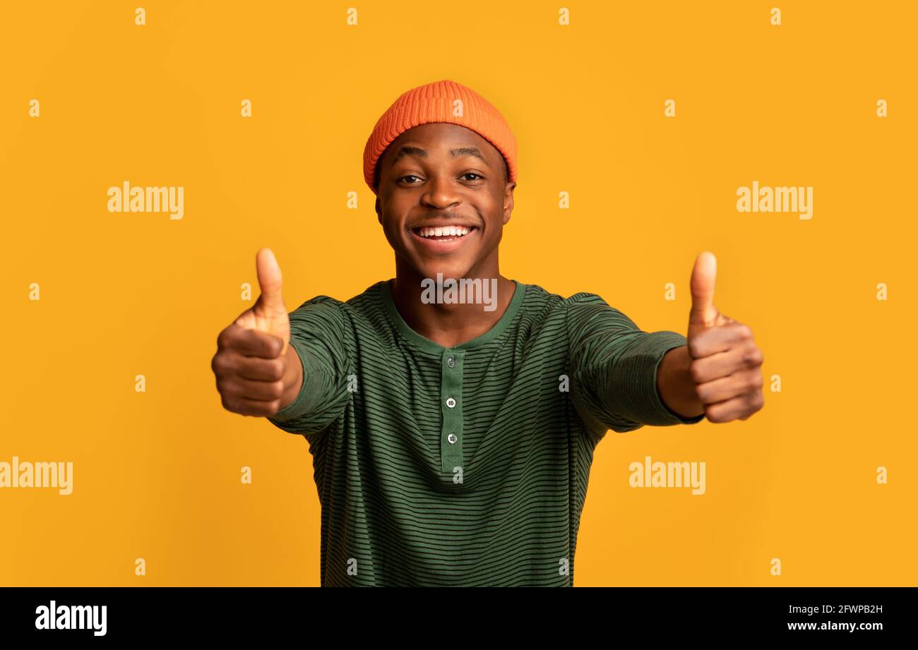 Portrait happy hipster thumbs up hi-res stock photography and images ...