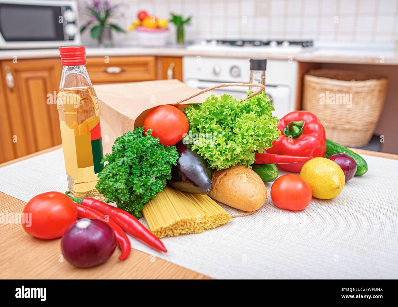 Healthy food products on the table in the kitchen Stock Photo - Alamy