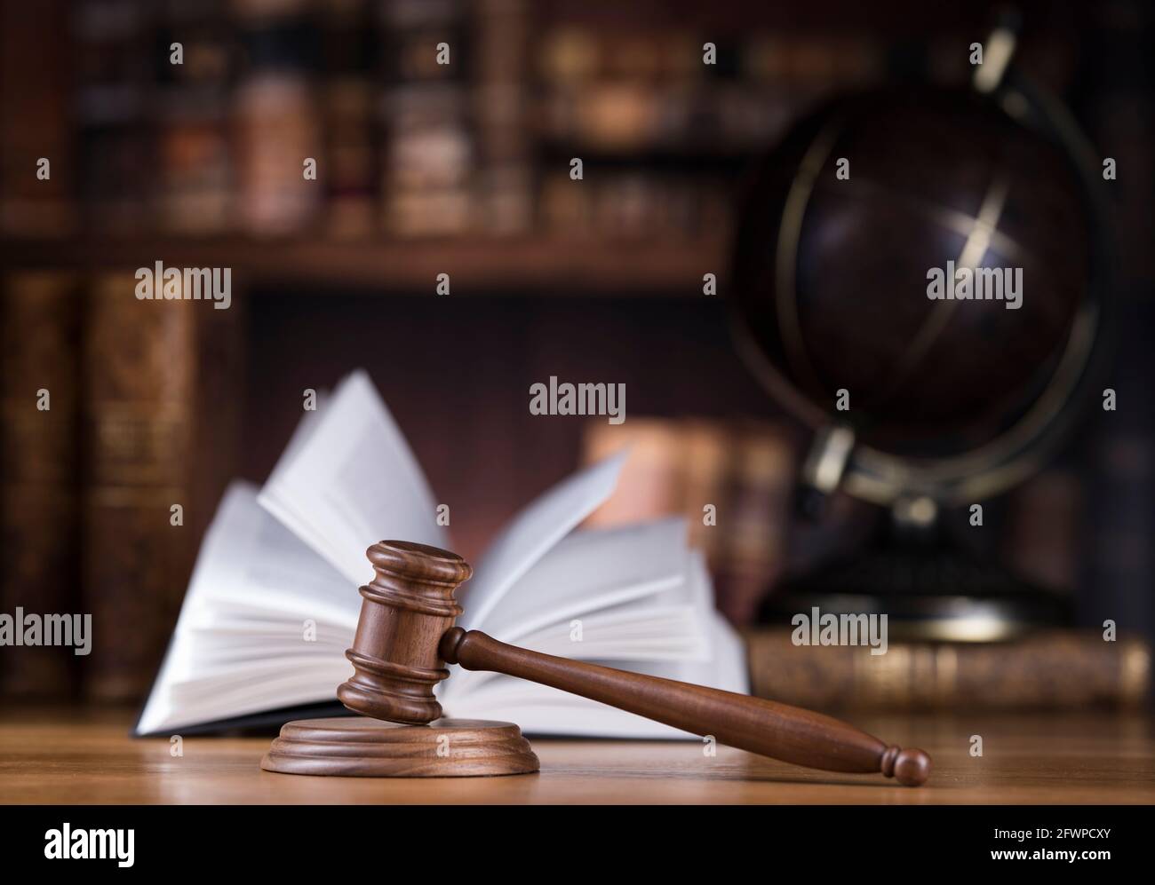 Globe background, Law theme, mallet of judge, wooden gavel Stock Photo ...