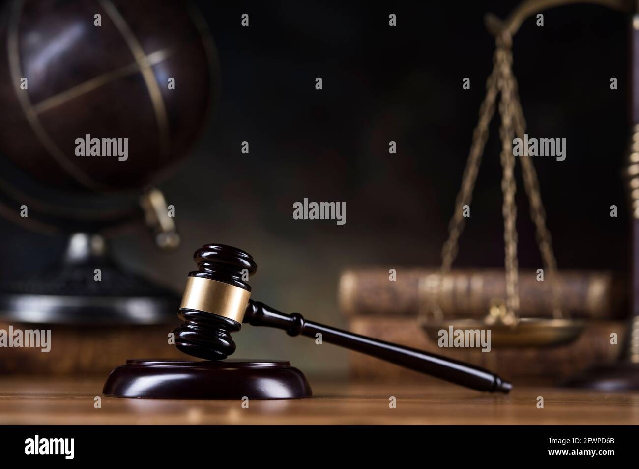 Law theme, mallet of judge, wooden gavel, globe background Stock Photo ...