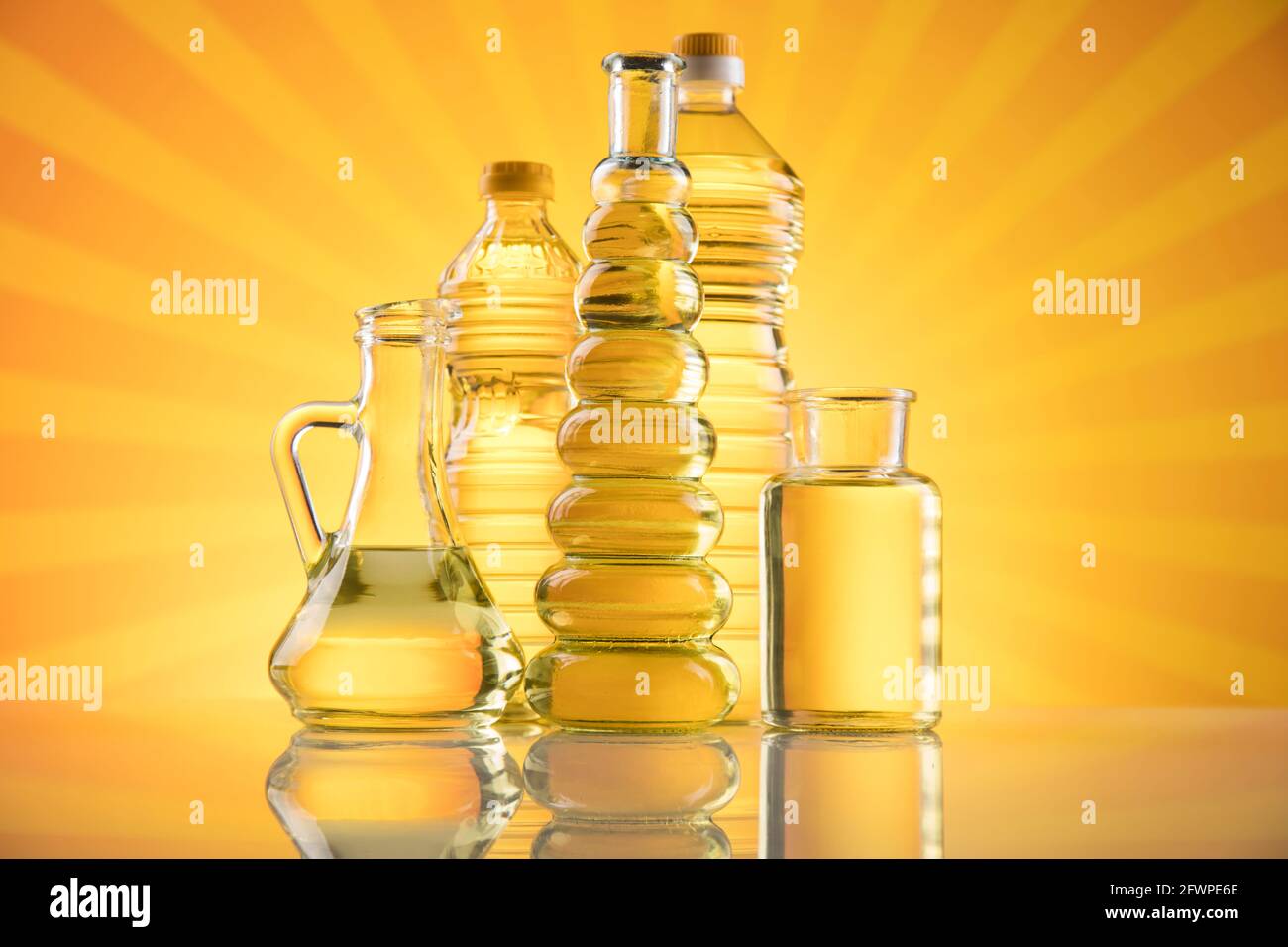 Bottles of olive oil, olive branch and Cooking oils Stock Photo - Alamy