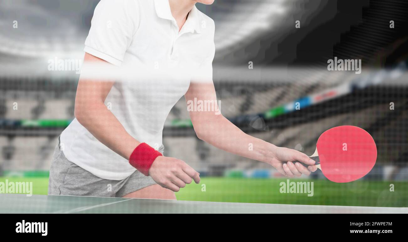 Composition of mid section of female table tennis player holding ball ...