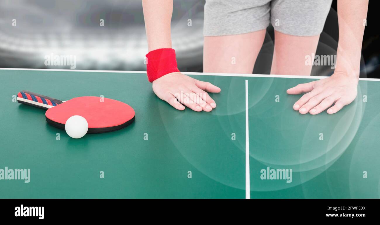Composition of mid section of female table tennis player leaning on ...