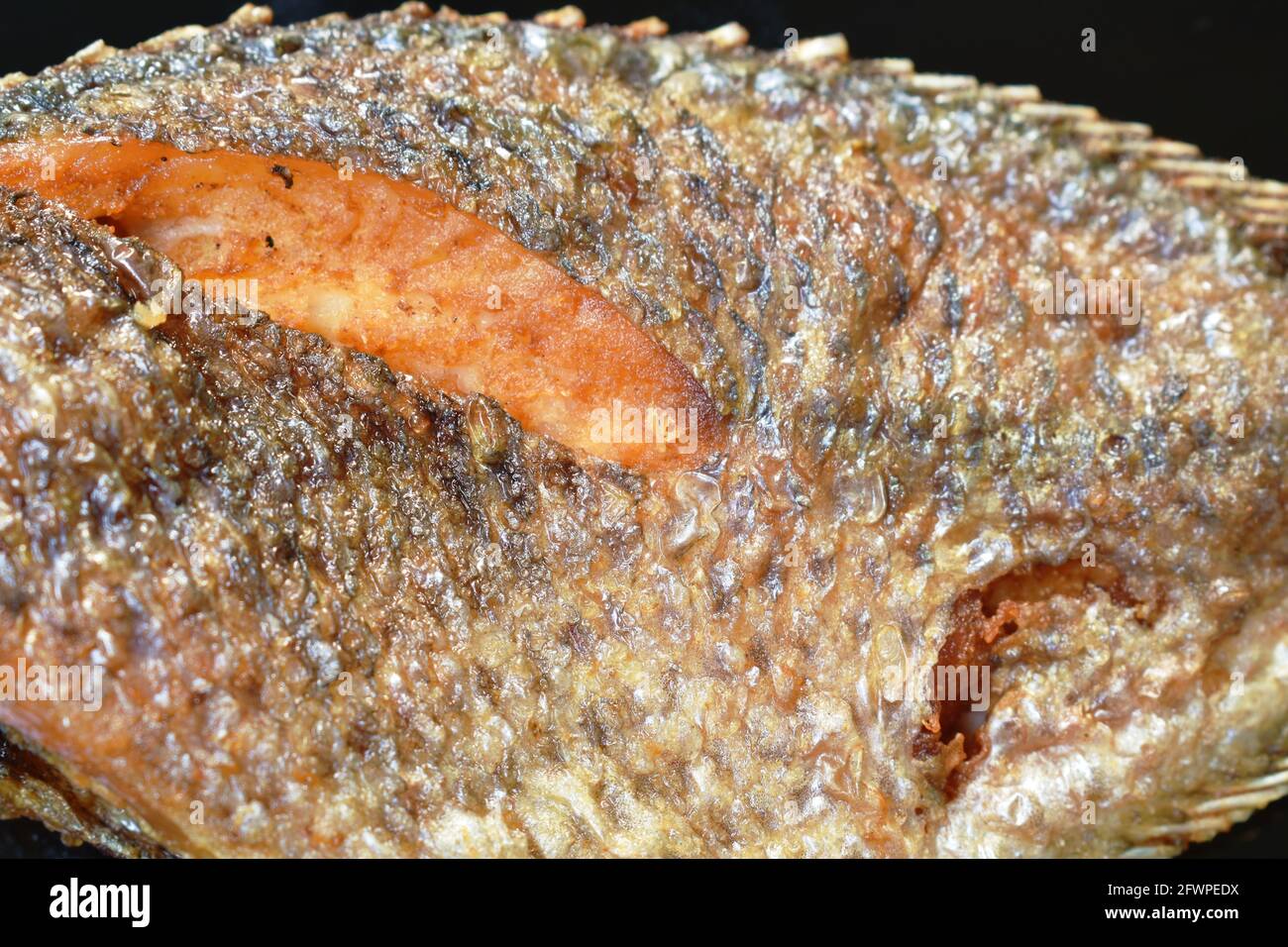 deep fried snake skin catfish or gourami on dish Stock Photo - Alamy