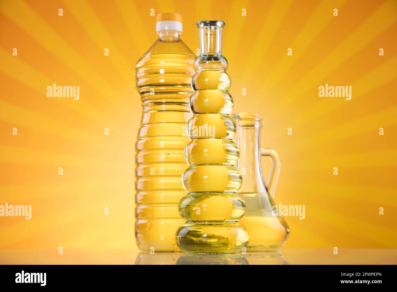 Bottles of olive oil, olive branch and Cooking oils Stock Photo - Alamy