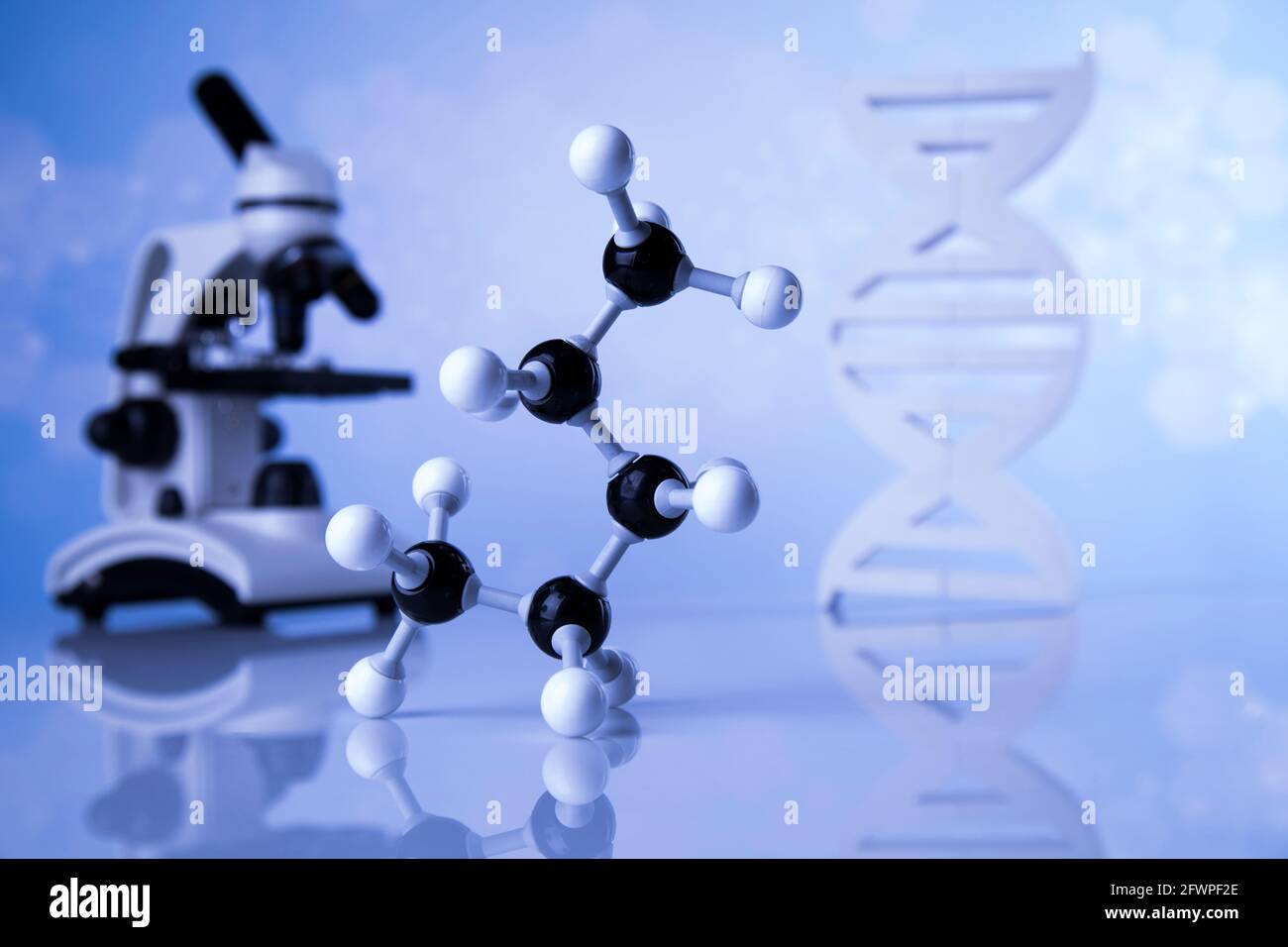 Atom, Microscope, Laboratory beakers,Science experiment Stock Photo - Alamy