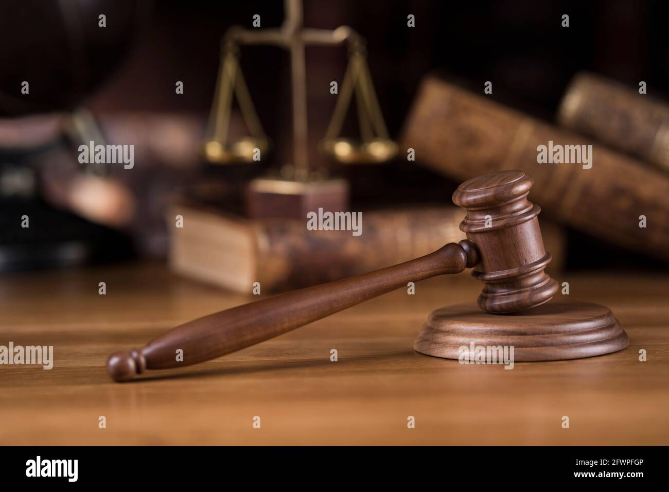 Law and justice concept, Brown wooden background Stock Photo - Alamy