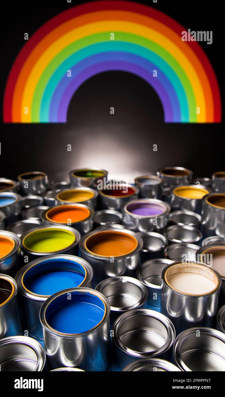 Rainbow colors, Open cans of paint Stock Photo - Alamy