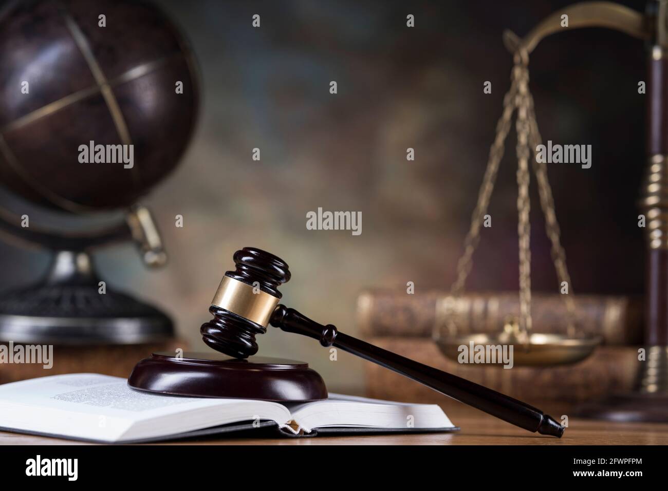 Law theme, mallet of judge, wooden gavel, globe background Stock Photo ...