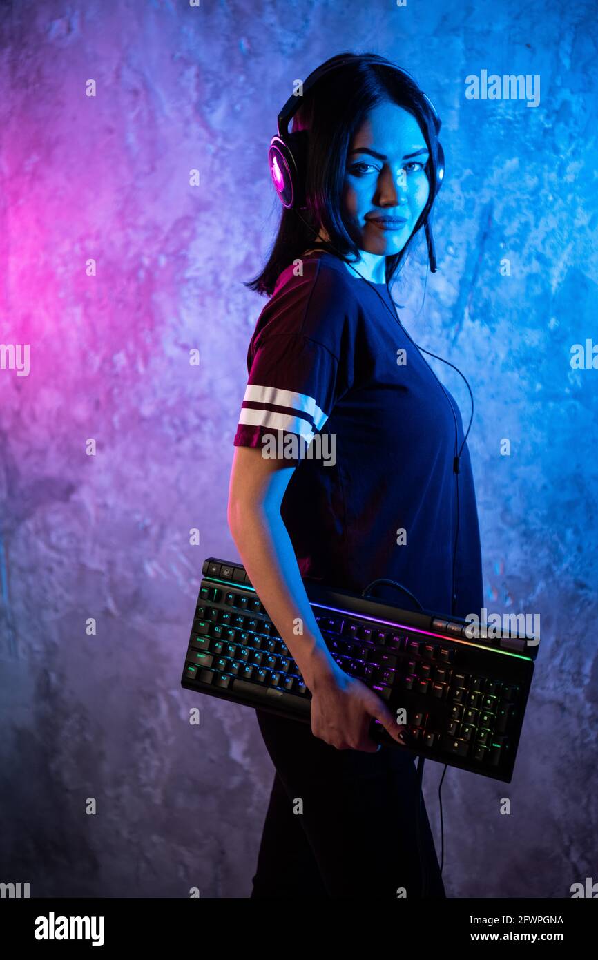 Beautiful Friendly Pro Gamer Streamer Girl Posing With a Keyboard in ...