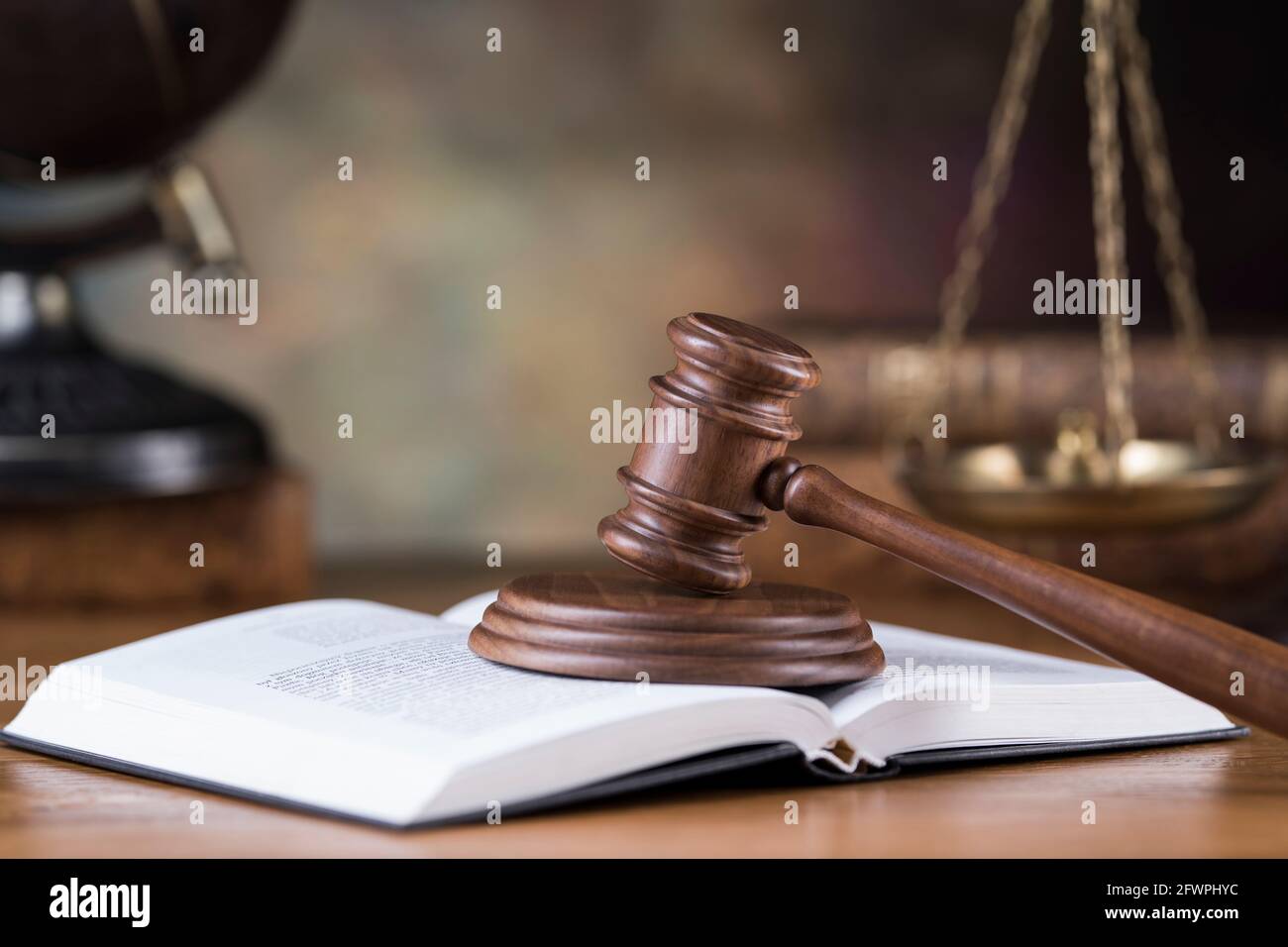 Law theme, mallet of judge, wooden gavel, globe background Stock Photo ...