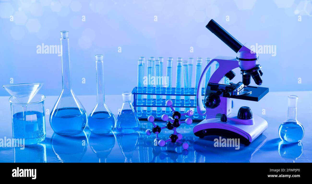 Laboratory equipment, glass filled background Stock Photo - Alamy