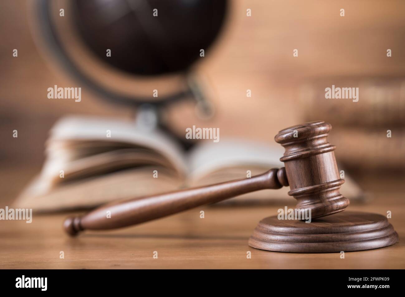 Law theme, mallet of judge, wooden gavel, globe background Stock Photo ...