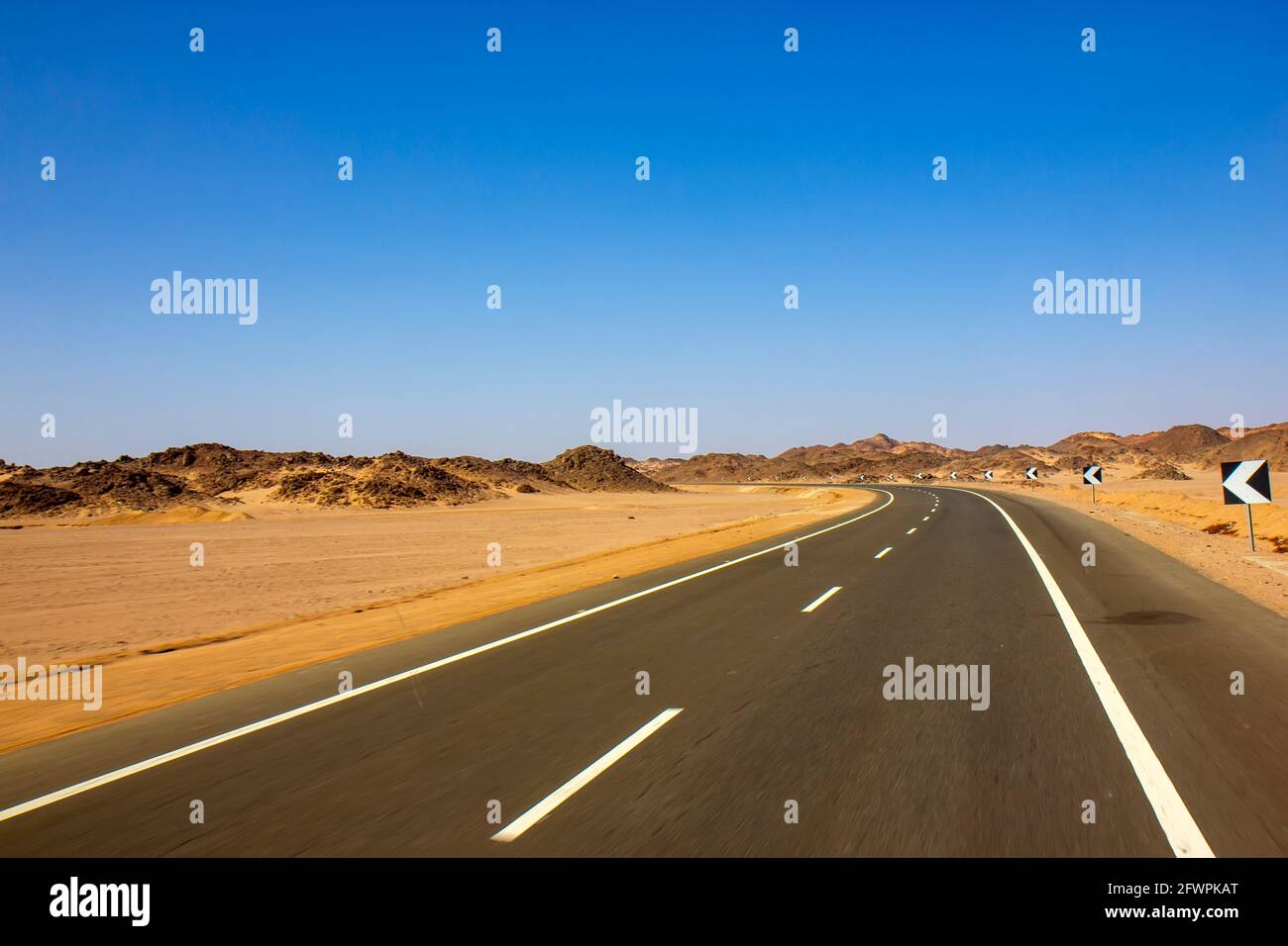 View of the road in Egypt stone desert Stock Photo - Alamy