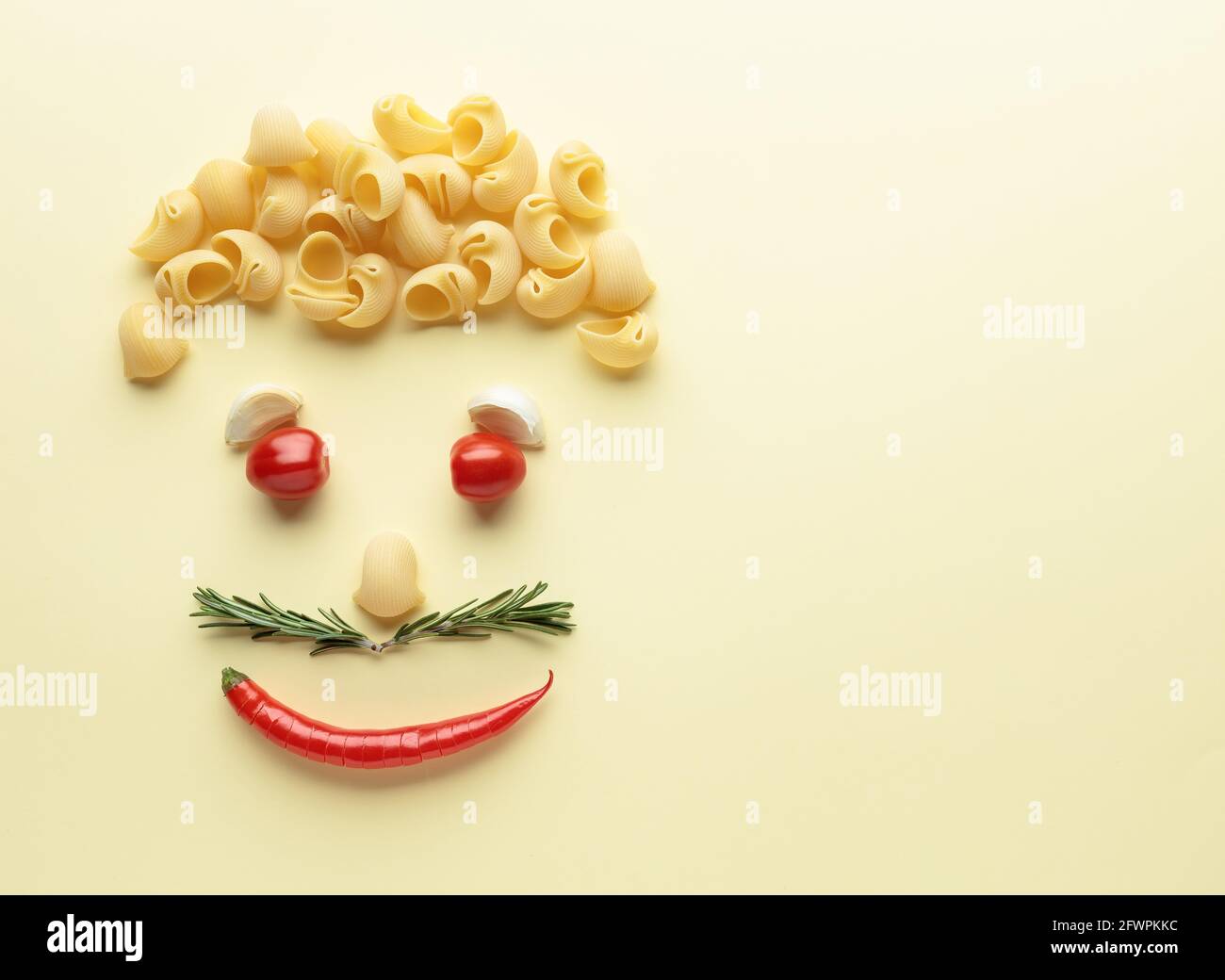 Funny portrait of a chef. Using ingredients for making pasta. Copy ...