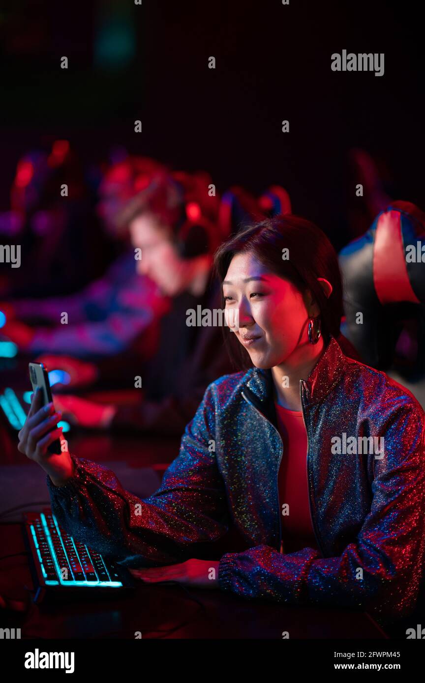 During the esports championship, a young chinese streamer records a ...