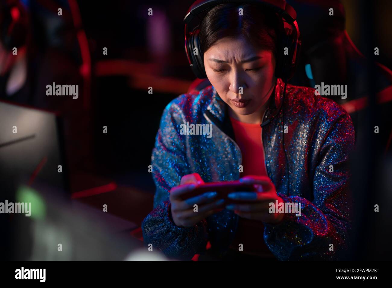 The chinese gamer girl decided to take a break and play on her ...