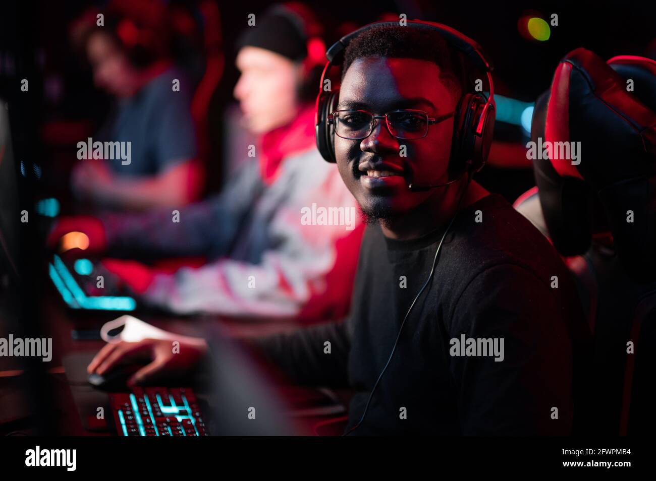 A member of the esports team at a bootcamp training session. Portrait ...