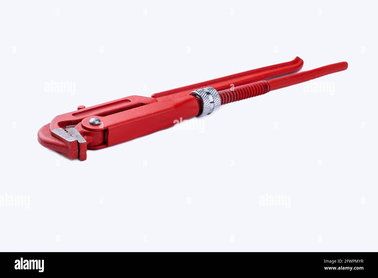 Adjustable red pipe wrench isolated on white background Stock Photo - Alamy