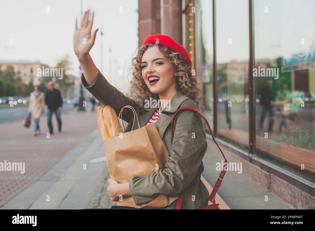 Attractive young woman saying hello hi-res stock photography and images ...