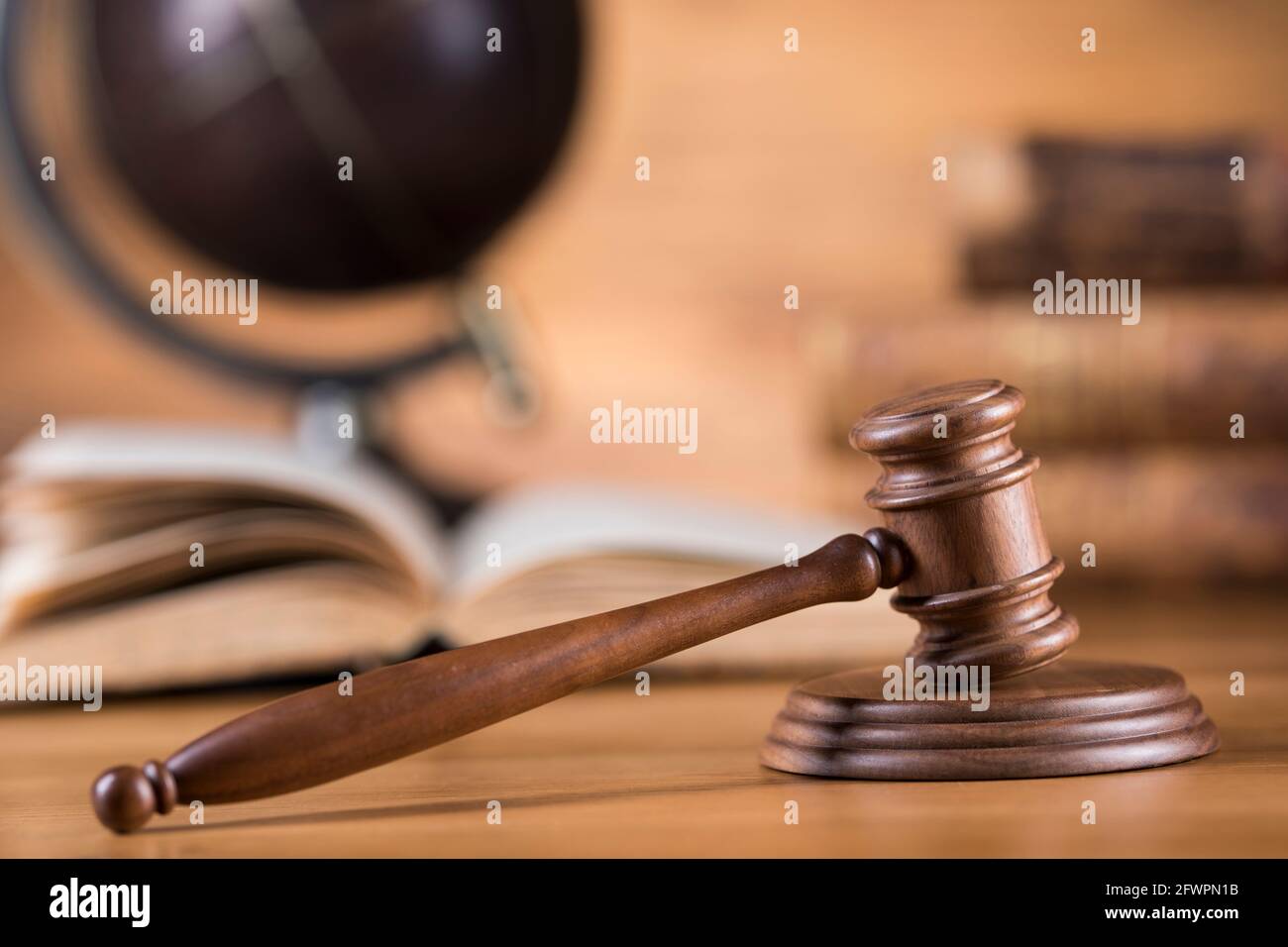 Law theme, mallet of judge, wooden gavel, globe background Stock Photo ...