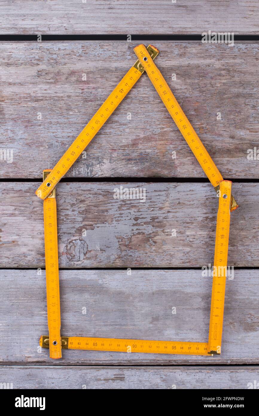 Construction folding ruler house shape hi-res stock photography and ...