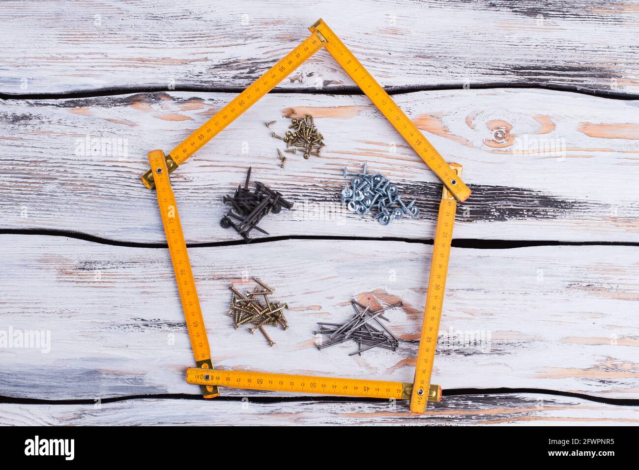 Construction folding ruler house shape hi-res stock photography and ...