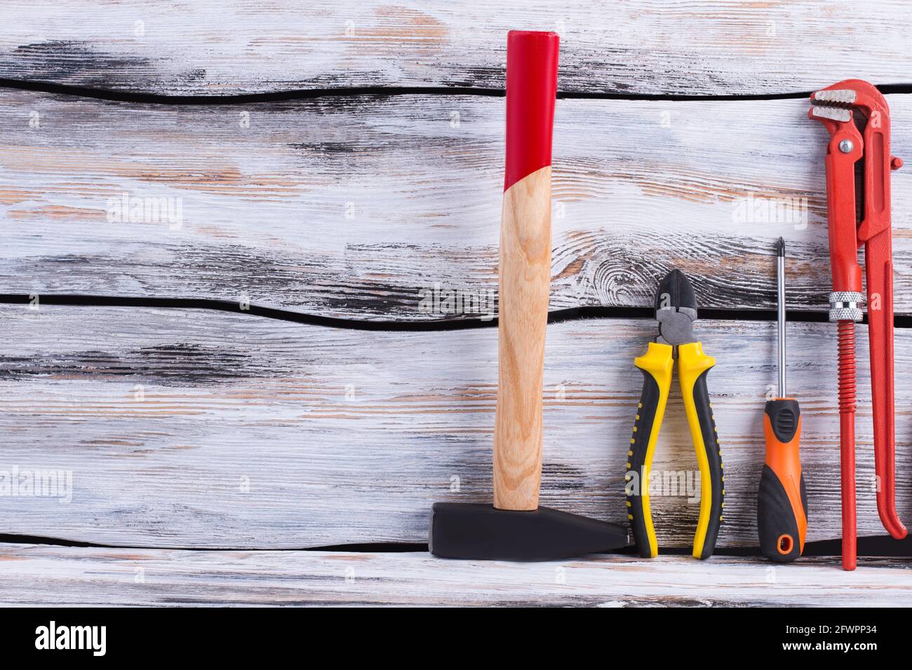 Set of construction tools on wooden background Stock Photo - Alamy