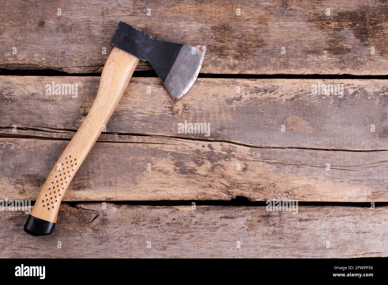 Top view of an axe on rustic wooden boards Stock Photo - Alamy